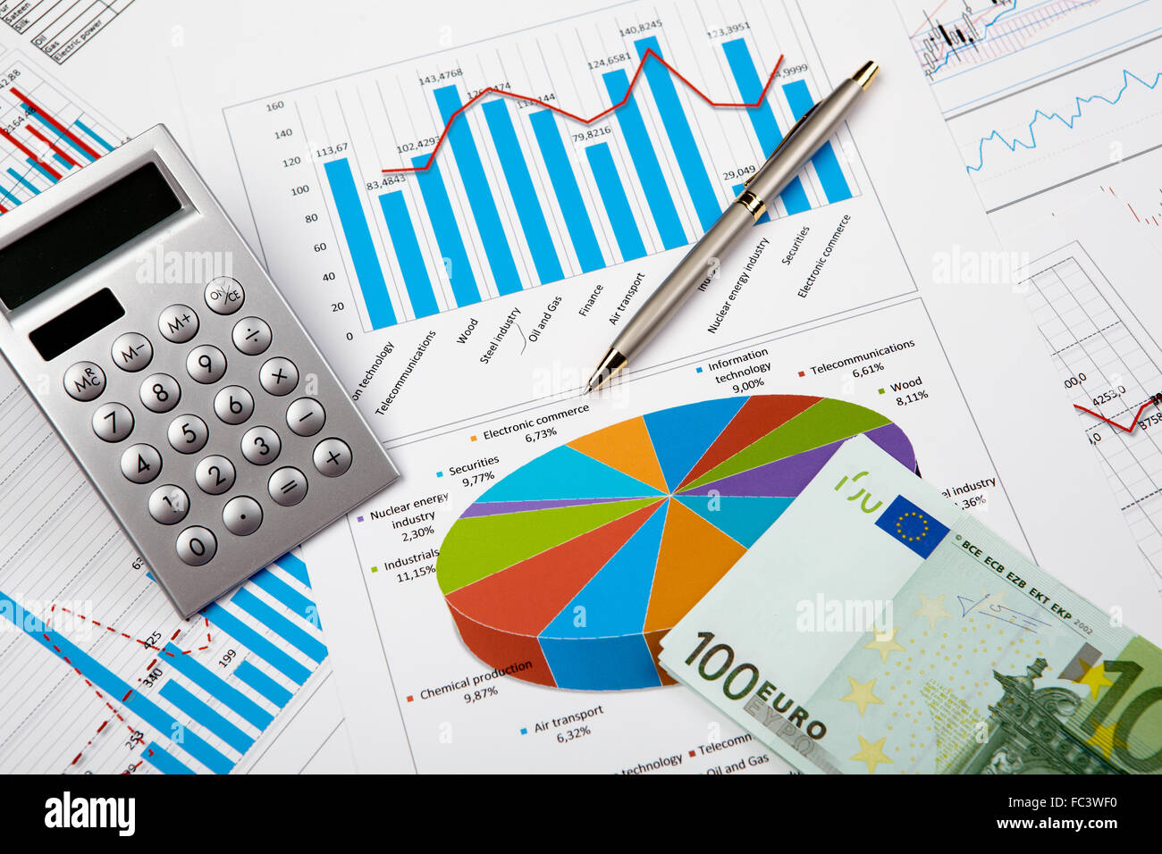 financial charts and graphs on the table Stock Photo - Alamy