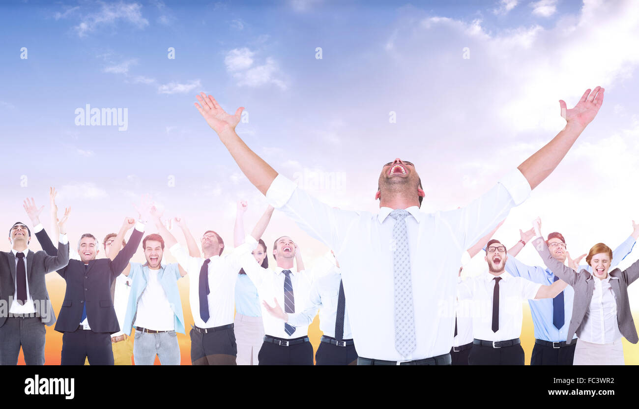 Composite image of handsome businessman cheering with arms up Stock ...