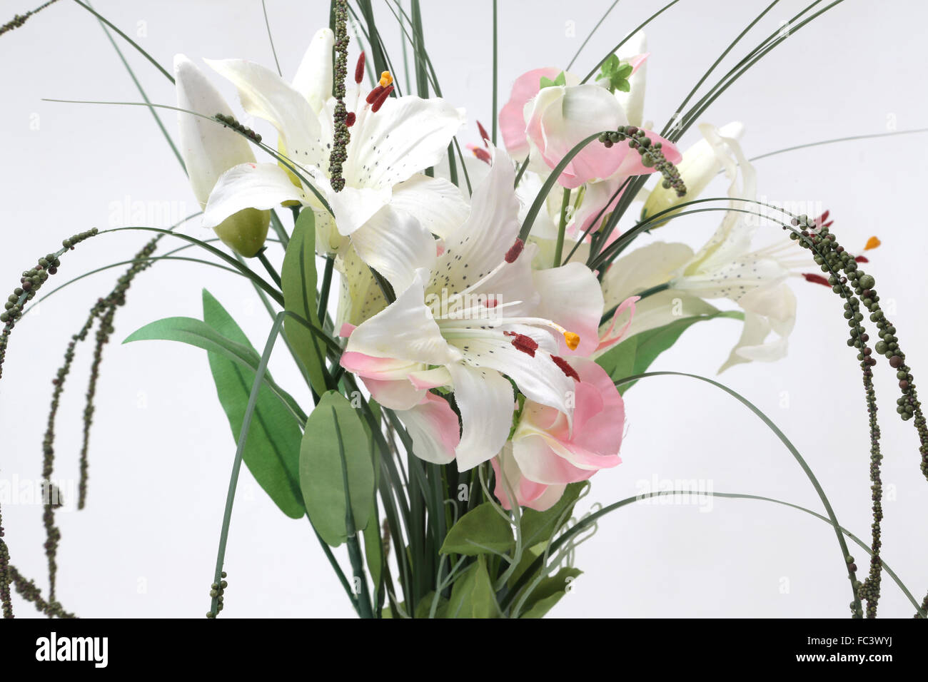 A Bouquet Of Fabric Flowers Fake Lillies Stock Photo - Alamy