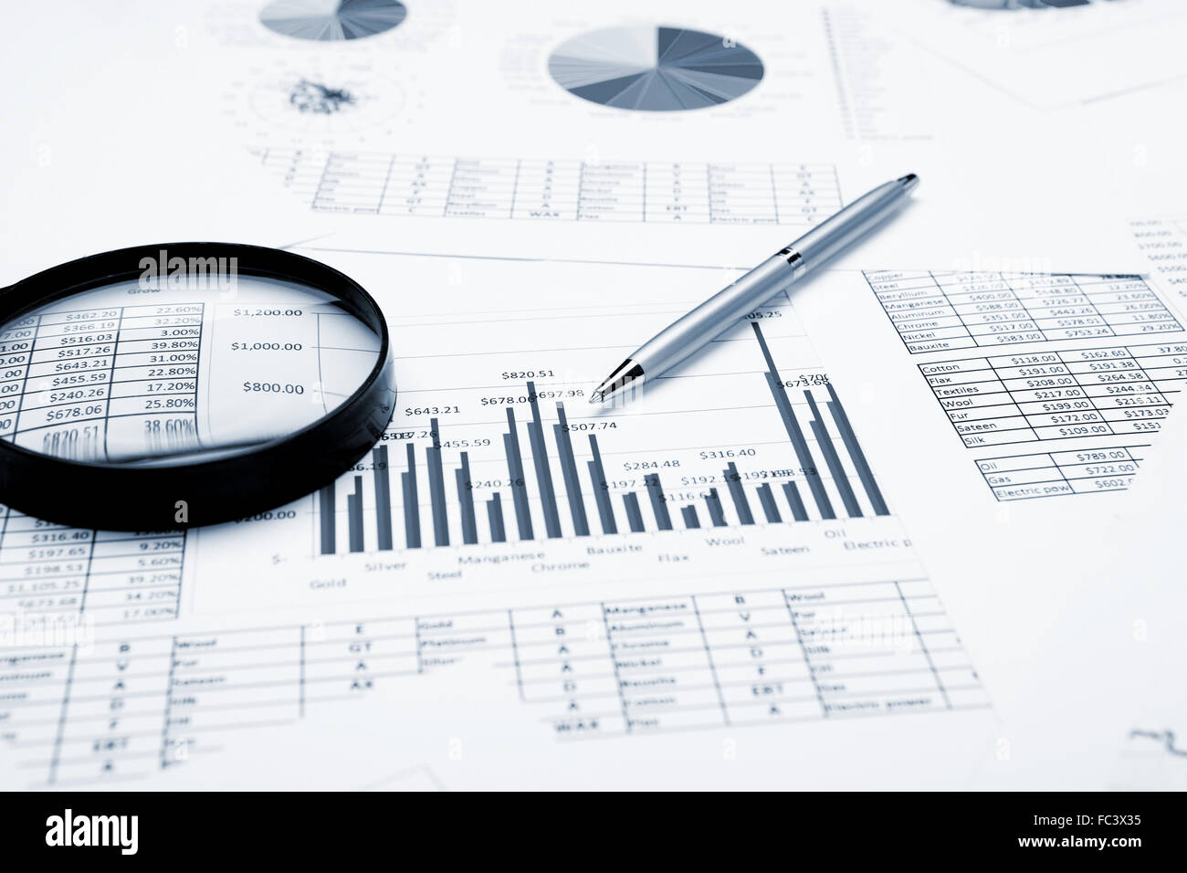 financial charts and graphs on the table Stock Photo - Alamy