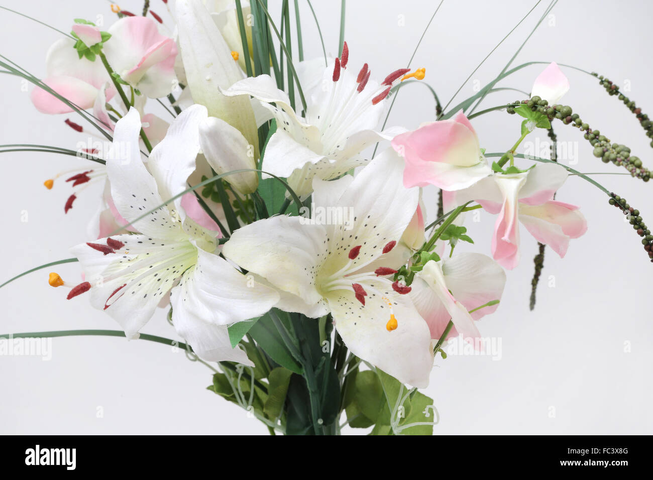 A Bouquet Of Fabric Flowers Fake Lillies Stock Photo - Alamy