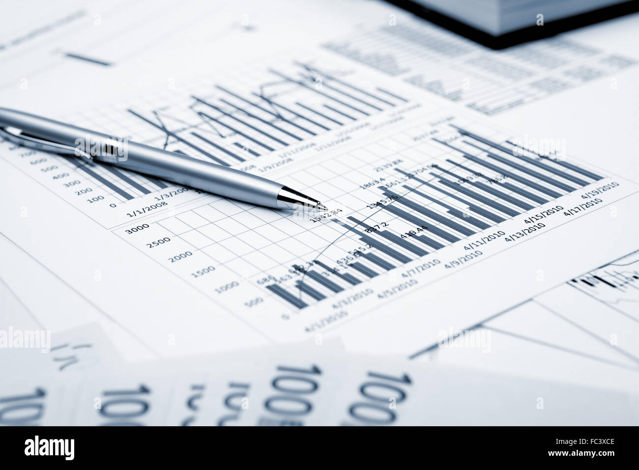 financial charts and graphs on the table Stock Photo - Alamy