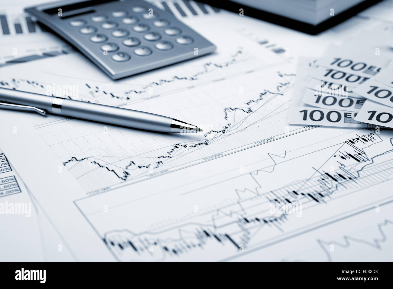 financial charts and graphs on the table Stock Photo - Alamy