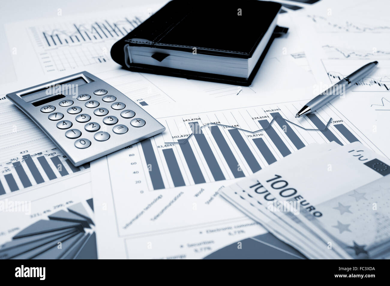 financial charts and graphs on the table Stock Photo - Alamy