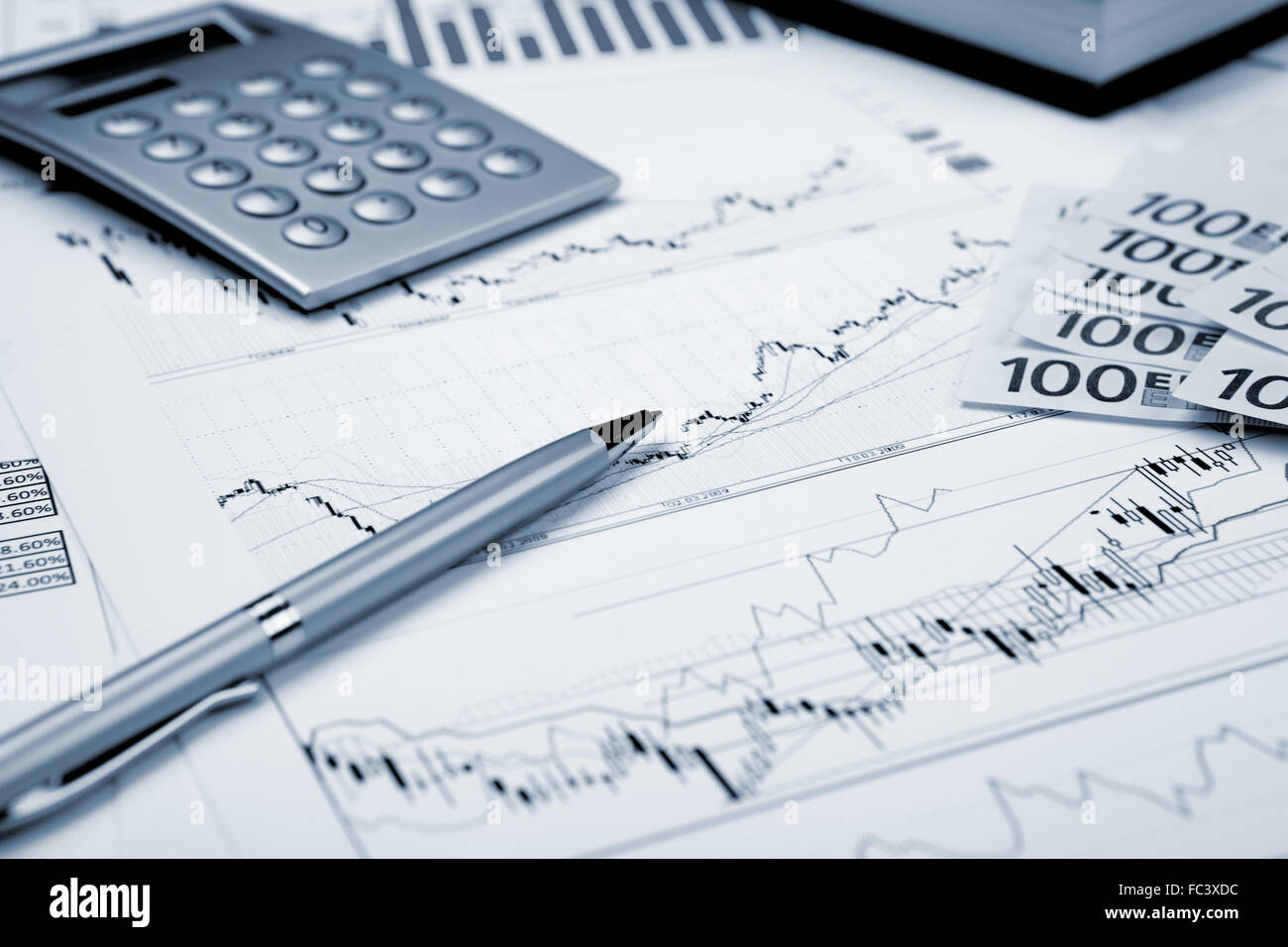financial charts and graphs on the table Stock Photo - Alamy