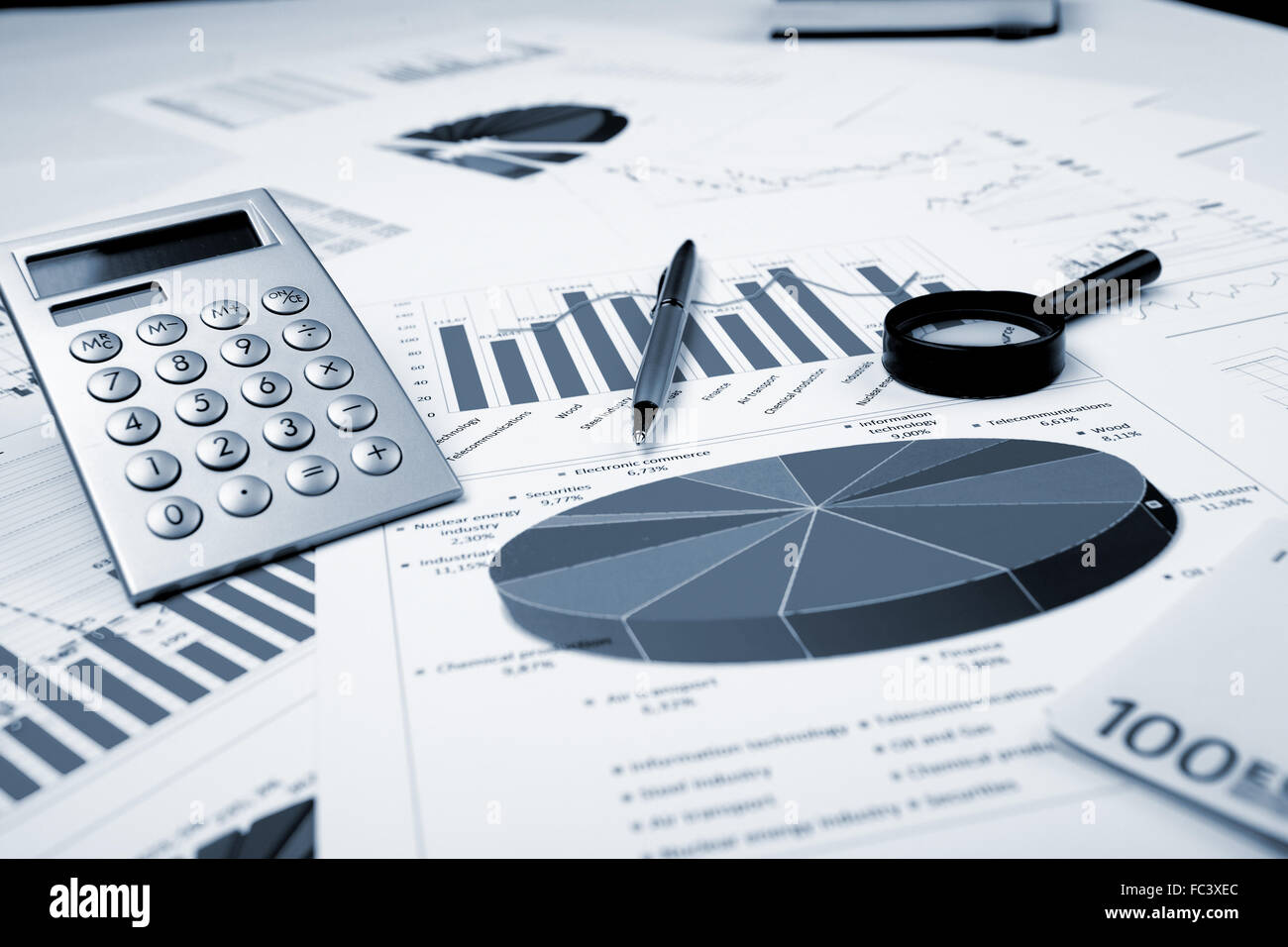 financial charts and graphs on the table Stock Photo - Alamy