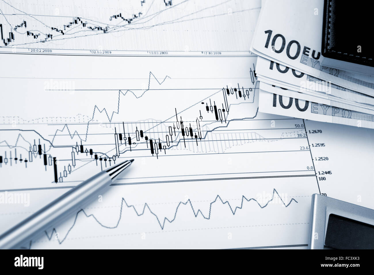 financial charts and graphs on the table Stock Photo - Alamy