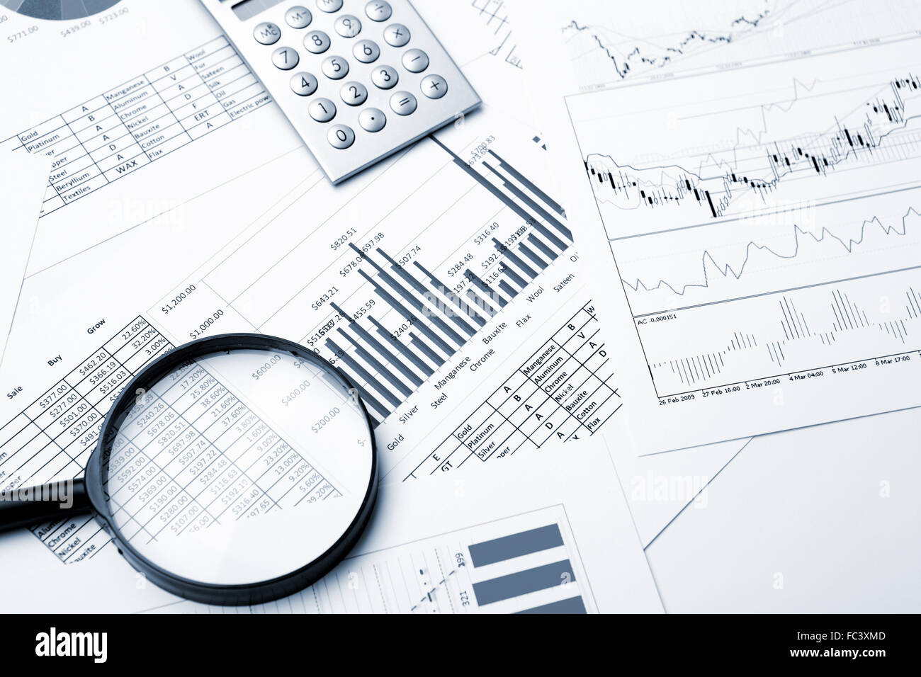 financial charts and graphs on the table Stock Photo - Alamy