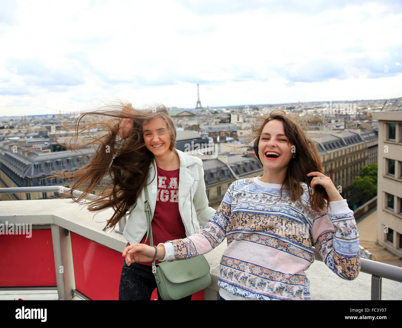 Happy beautiful girls in Paris Stock Photo - Alamy