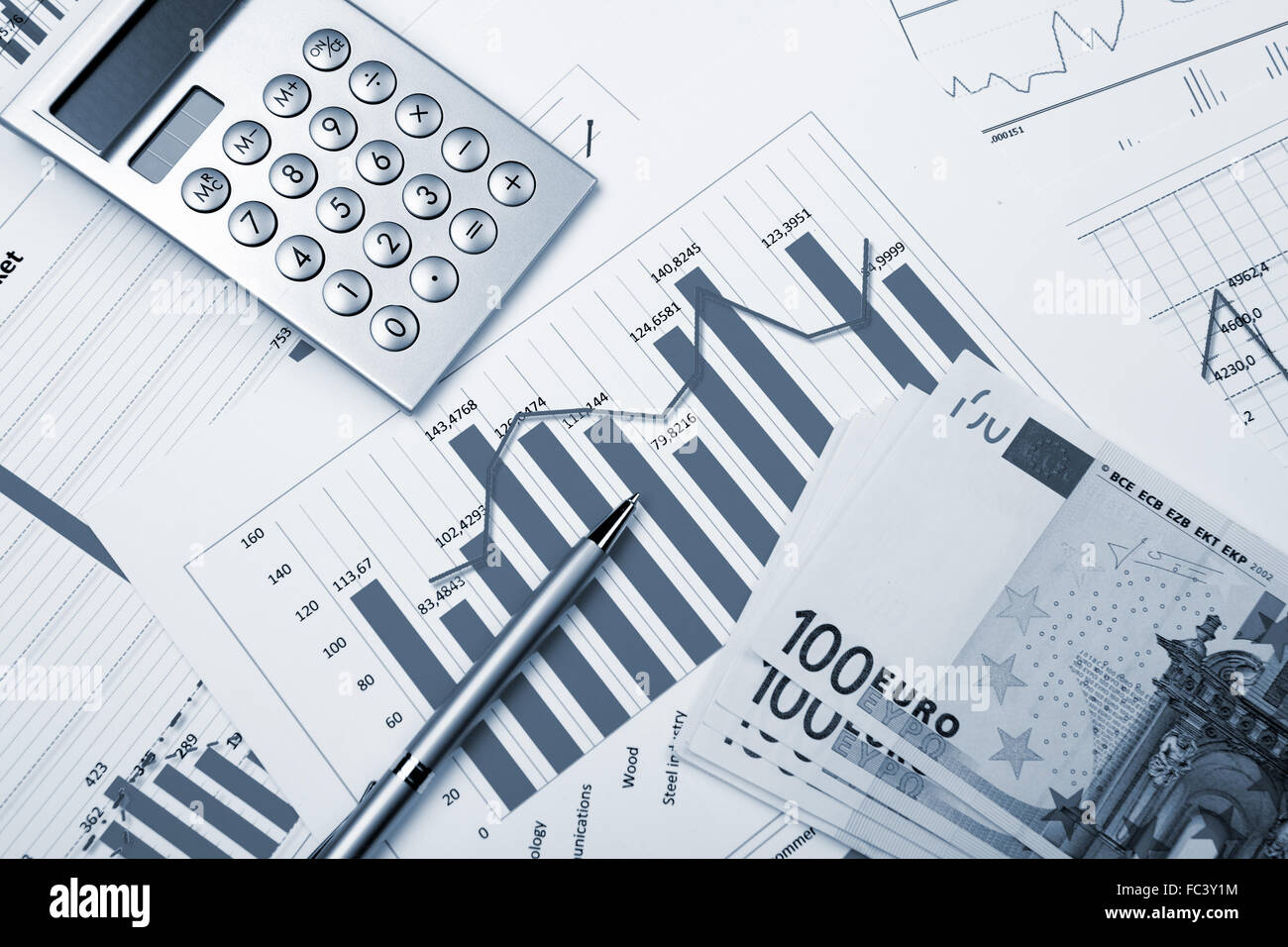 financial charts and graphs on the table Stock Photo - Alamy