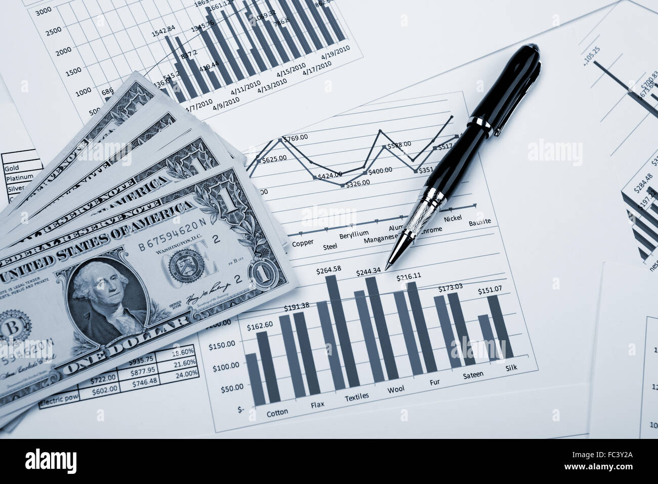 financial charts and graphs on the table Stock Photo - Alamy