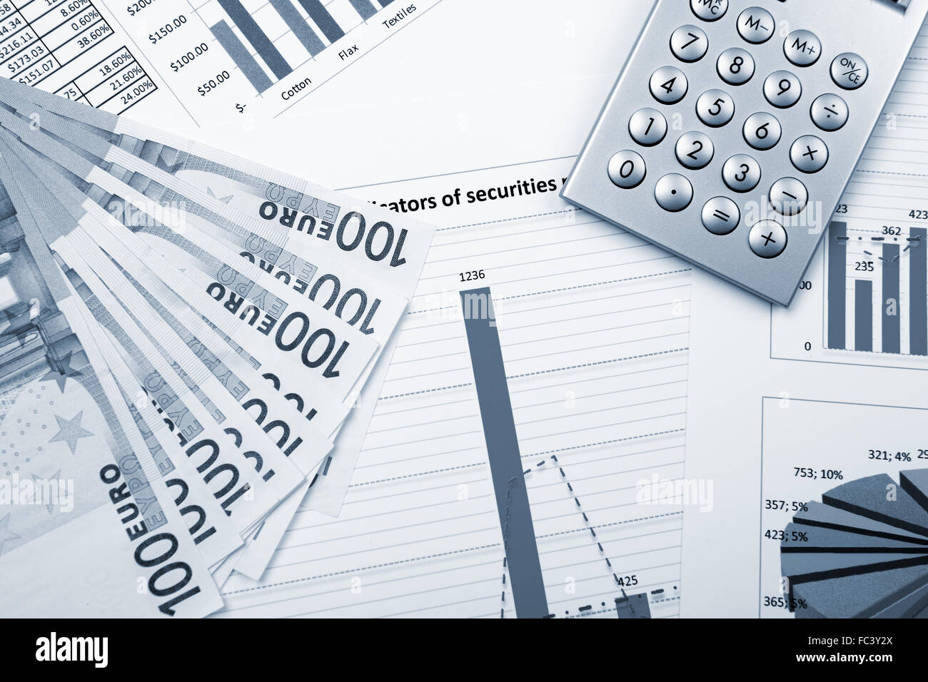 financial charts and graphs on the table Stock Photo - Alamy