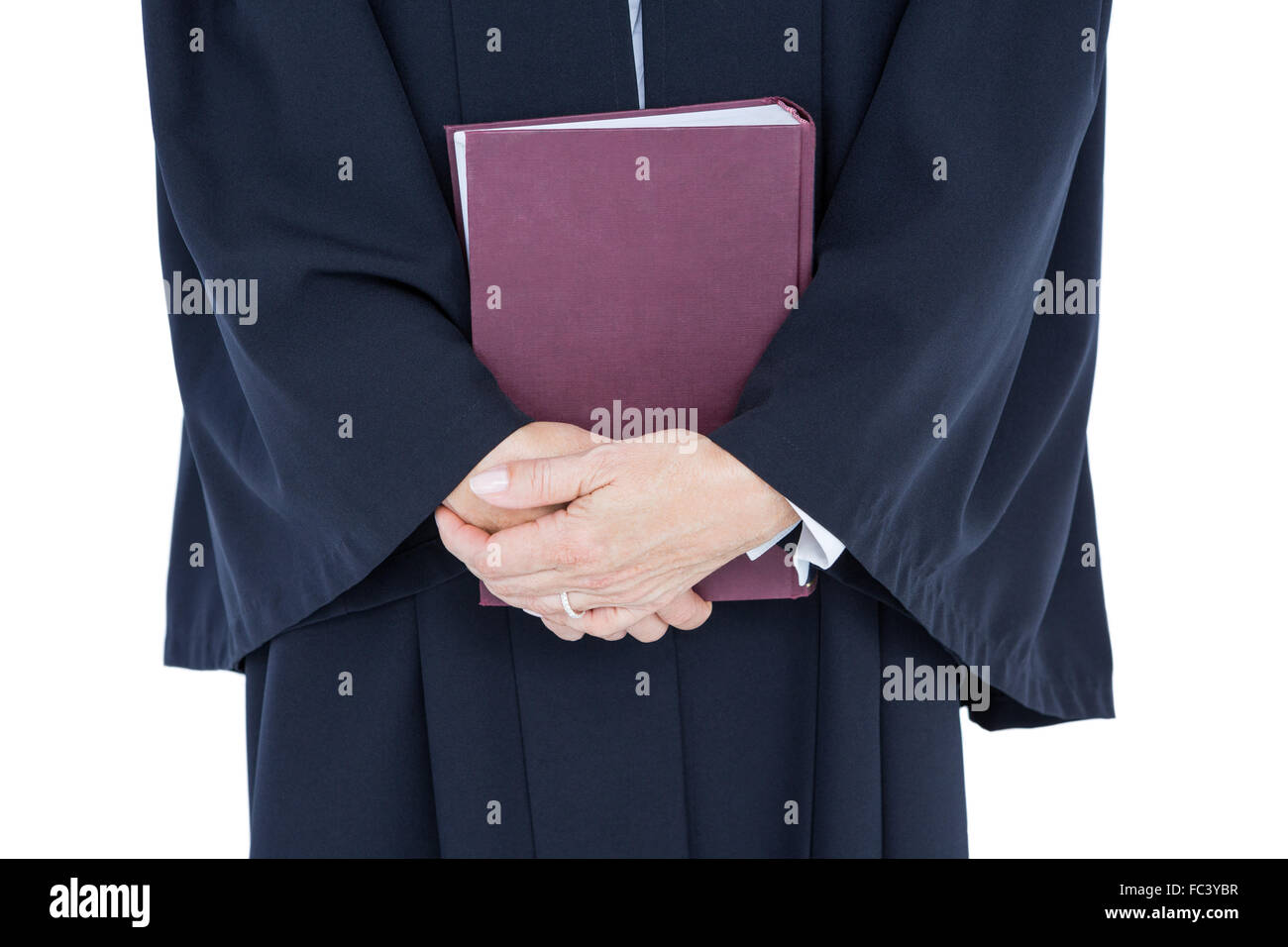 Happy lawyer looking at camera and holding law code Stock Photo - Alamy