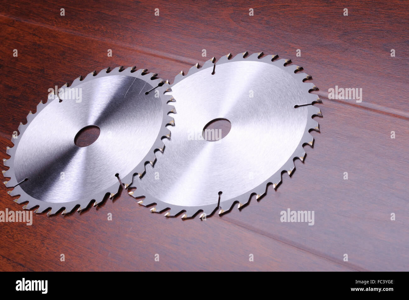 The metal disc is a circular saw on a dark background Stock Photo - Alamy