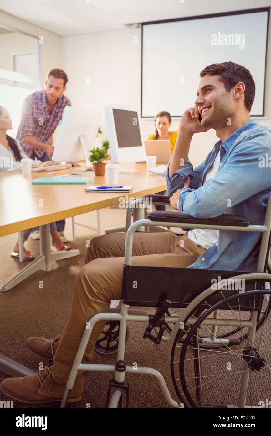 Paraplegic businessman on wheelchair studio hi-res stock photography ...