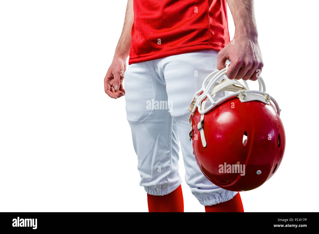 An american football player taking his helmet on her hand Stock Photo ...