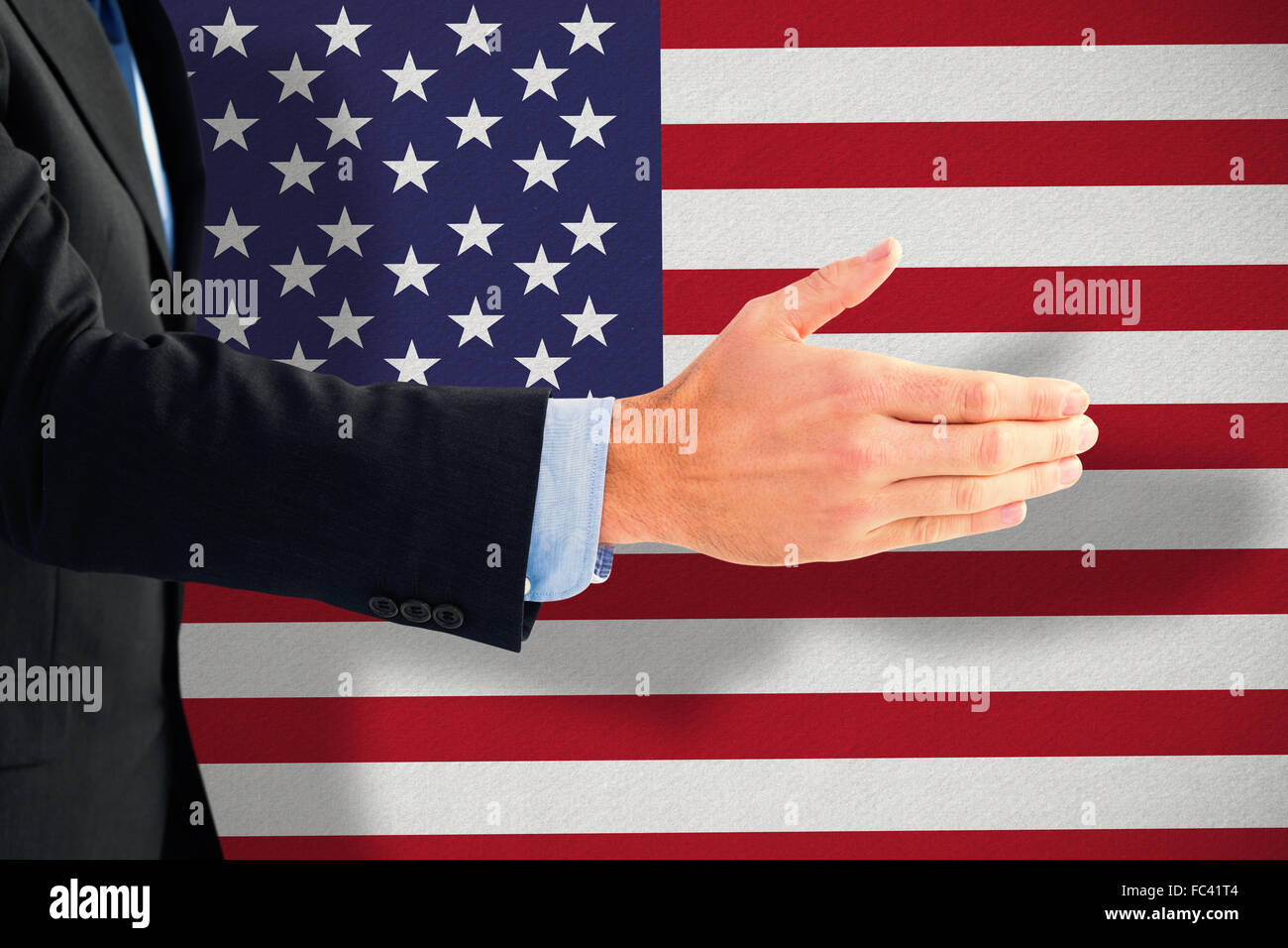 Composite image of businessman ready to shake hand Stock Photo - Alamy