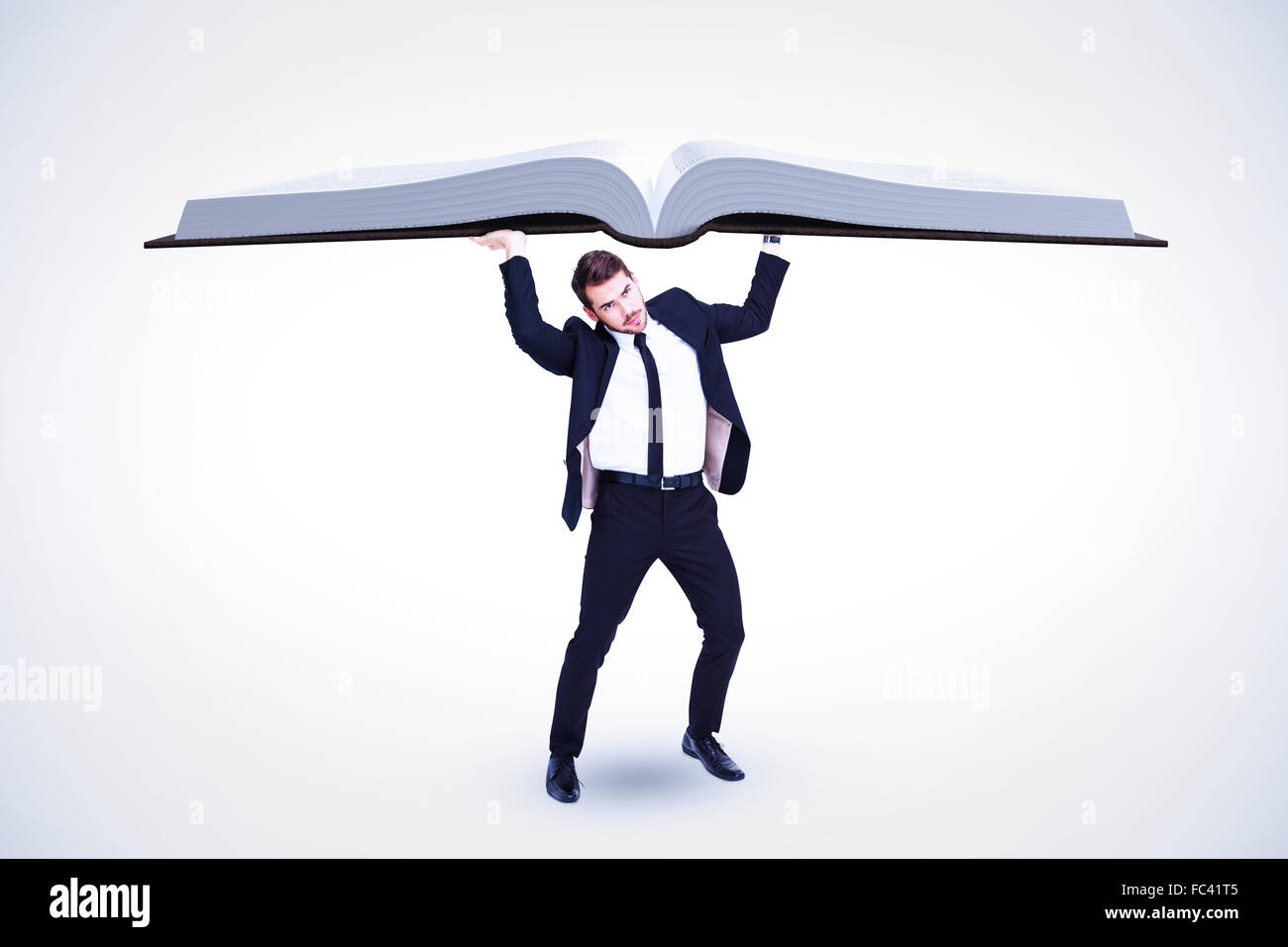 Composite image of businessman in suit lifting up something heavy Stock ...