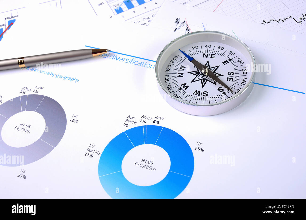 Graphs and charts. Workplace businessman Stock Photo - Alamy
