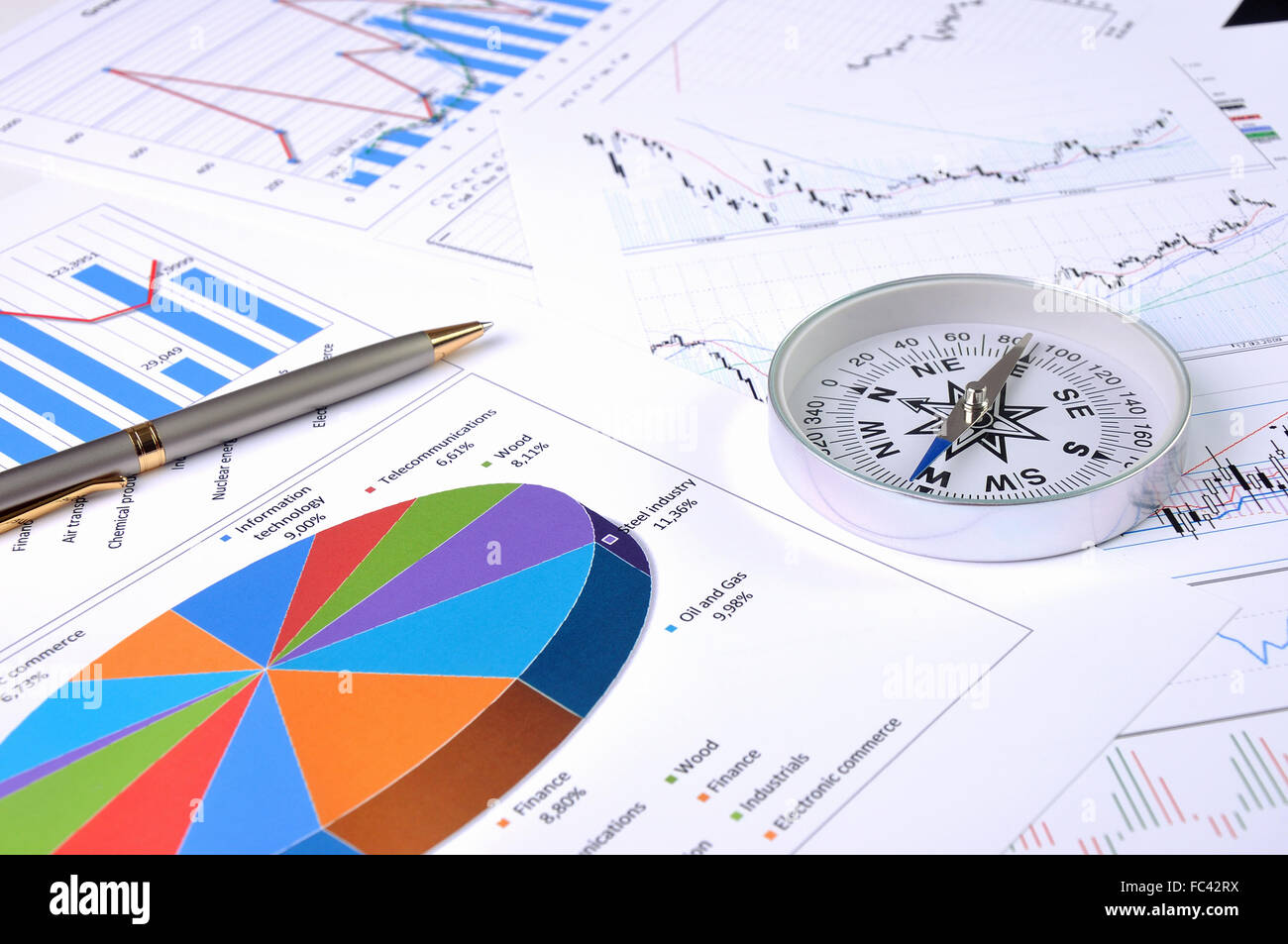 Graphs and charts. Workplace businessman Stock Photo - Alamy