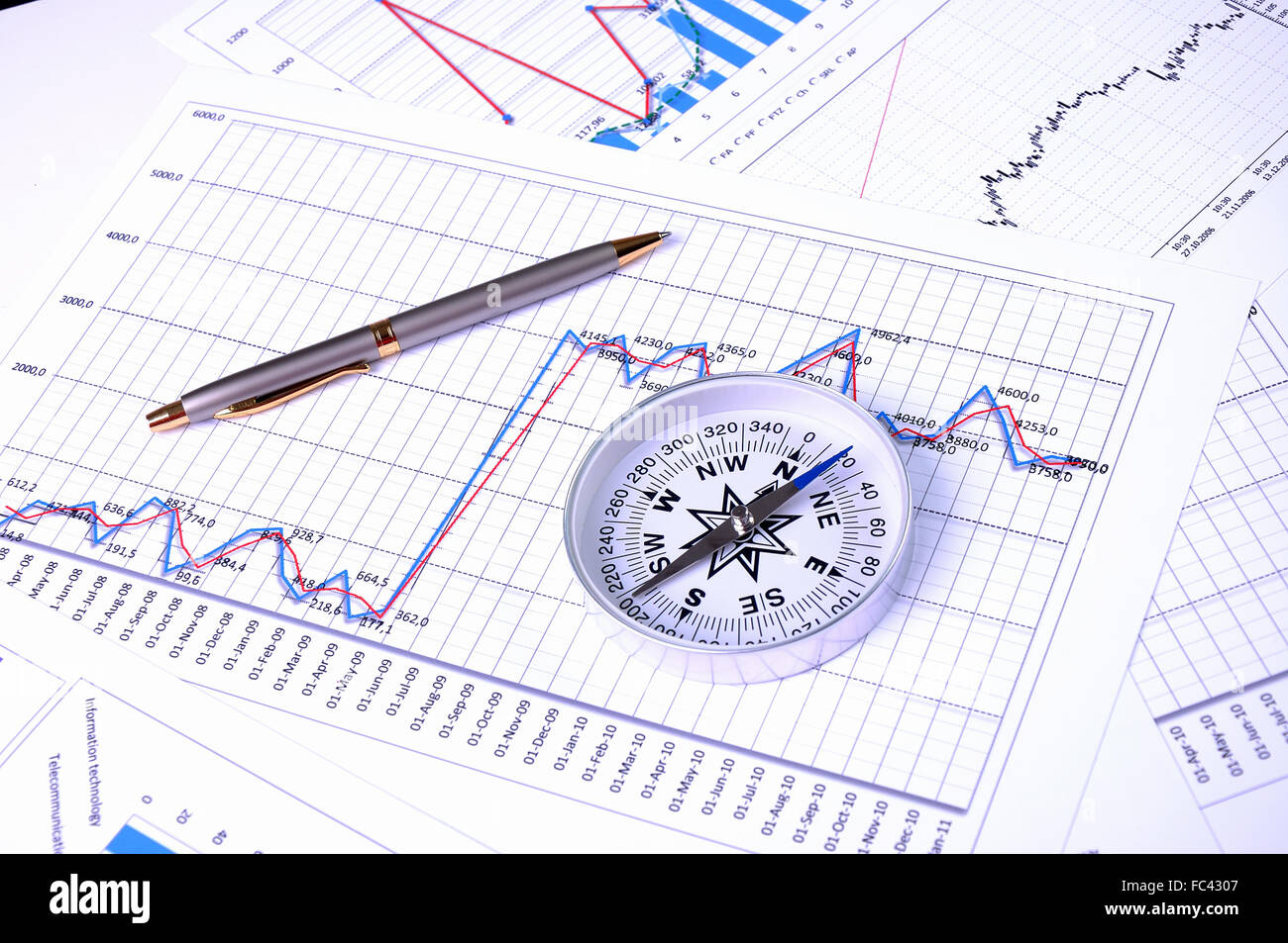 Graphs and charts. Workplace businessman Stock Photo - Alamy