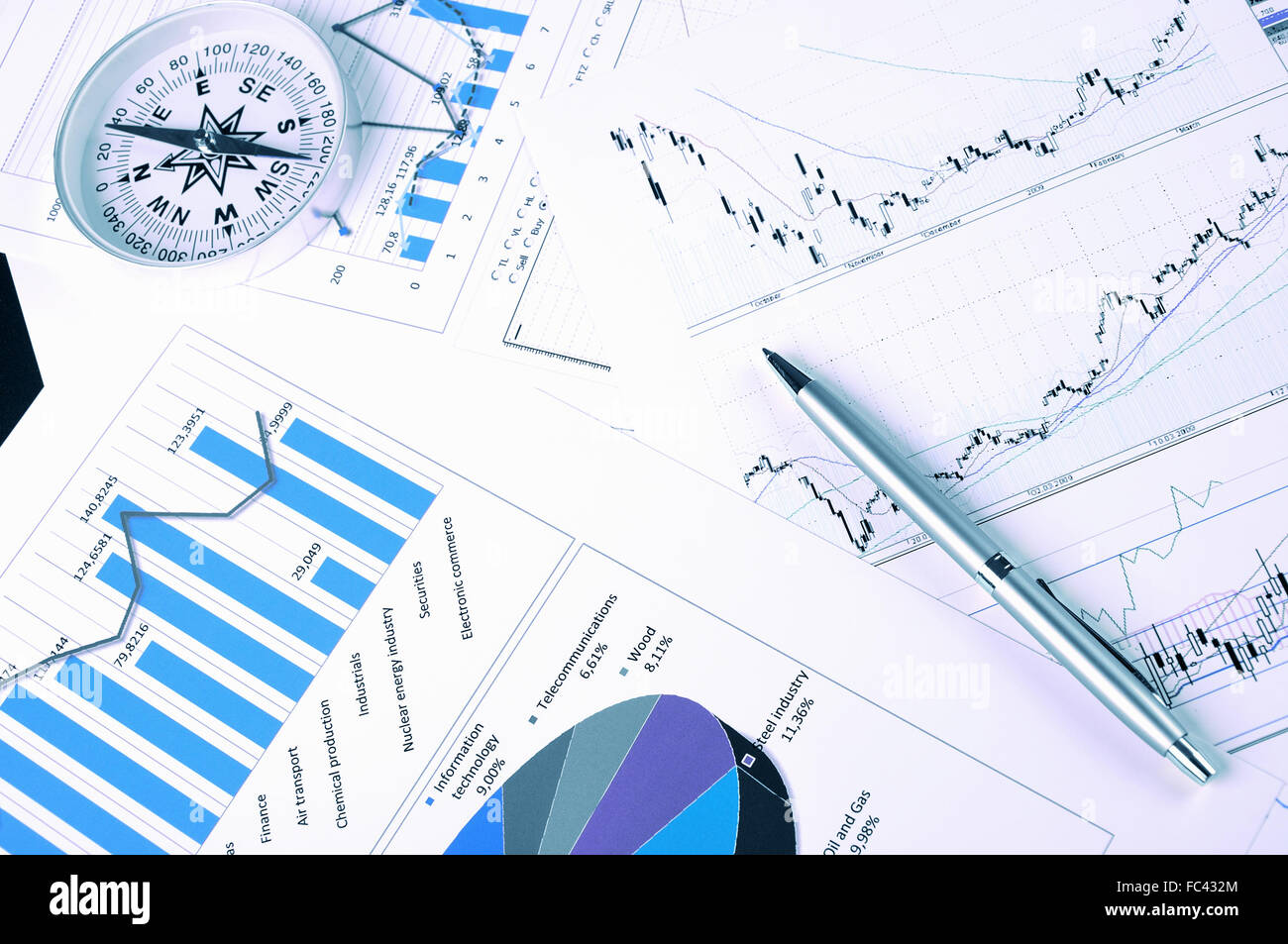 Graphs and charts. Workplace businessman Stock Photo - Alamy
