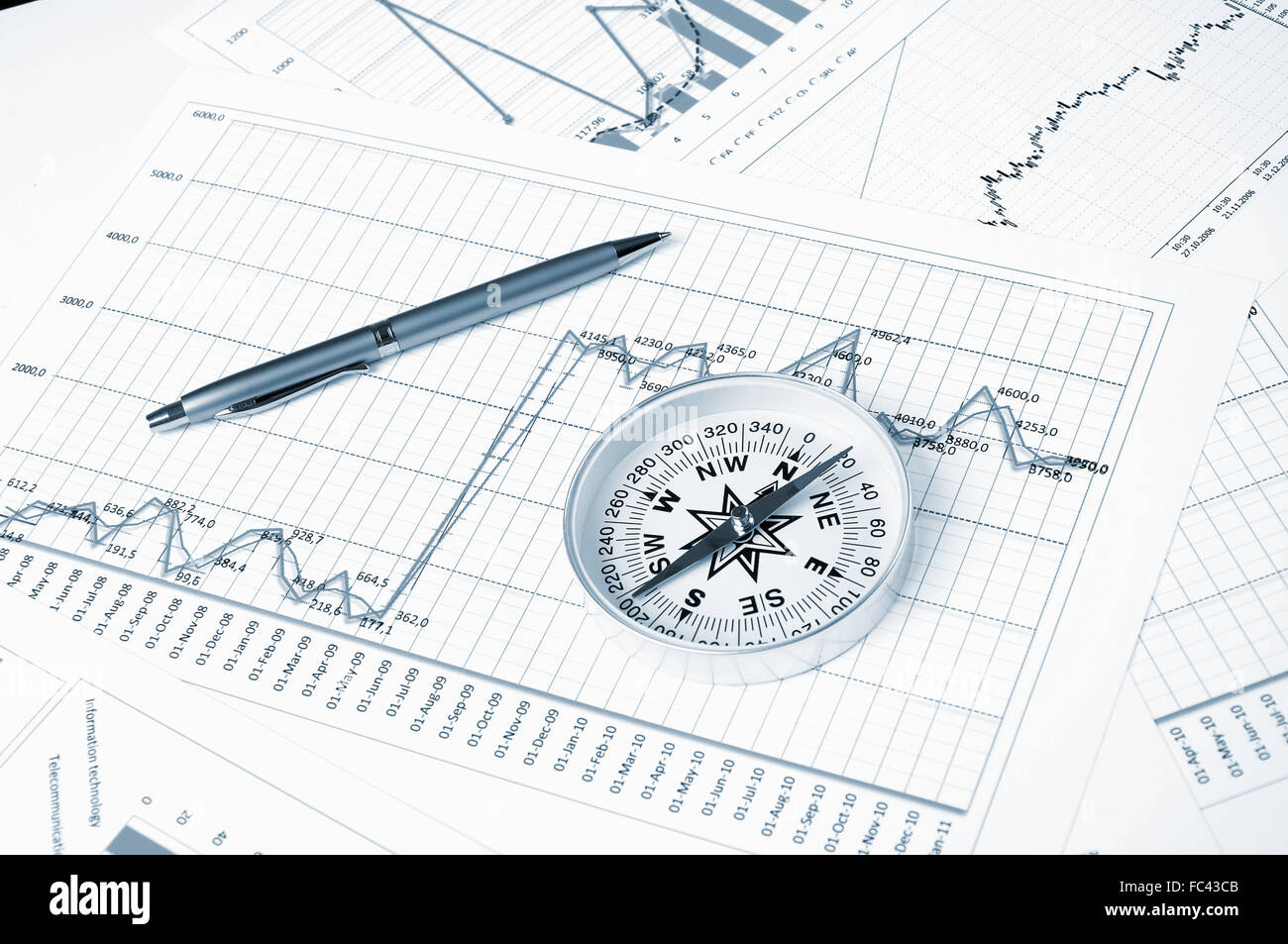 Graphs and charts. Workplace businessman Stock Photo - Alamy