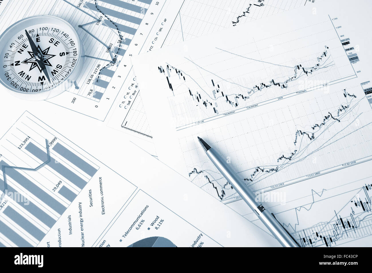 Graphs and charts. Workplace businessman Stock Photo - Alamy