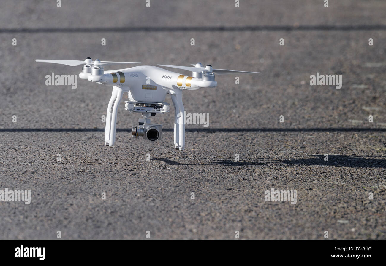 Phantom 3 Professional drone or quadcopter with wide angle video camera ...