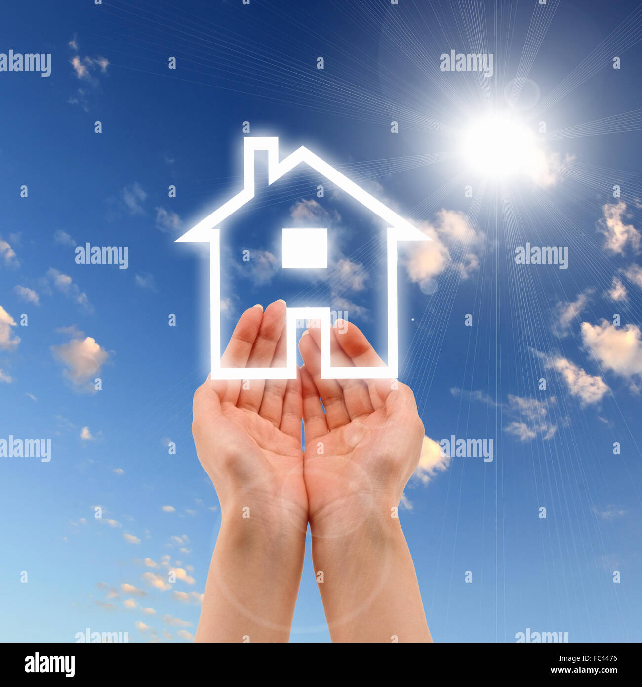 Human hand against blue sky background and house Stock Photo - Alamy