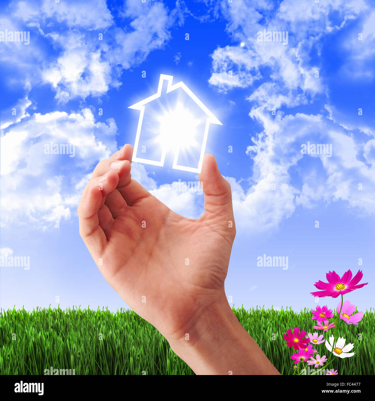 Human hand against blue sky background and house Stock Photo - Alamy