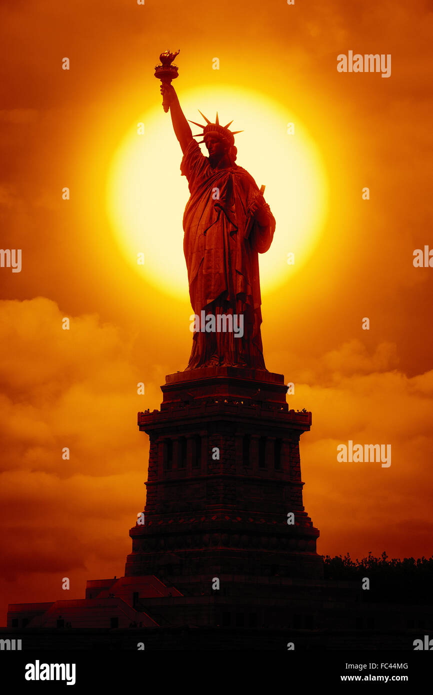 liberty statue at sunset Stock Photo - Alamy