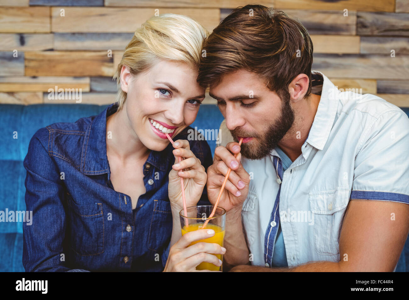 Sharing a glass hi-res stock photography and images - Alamy