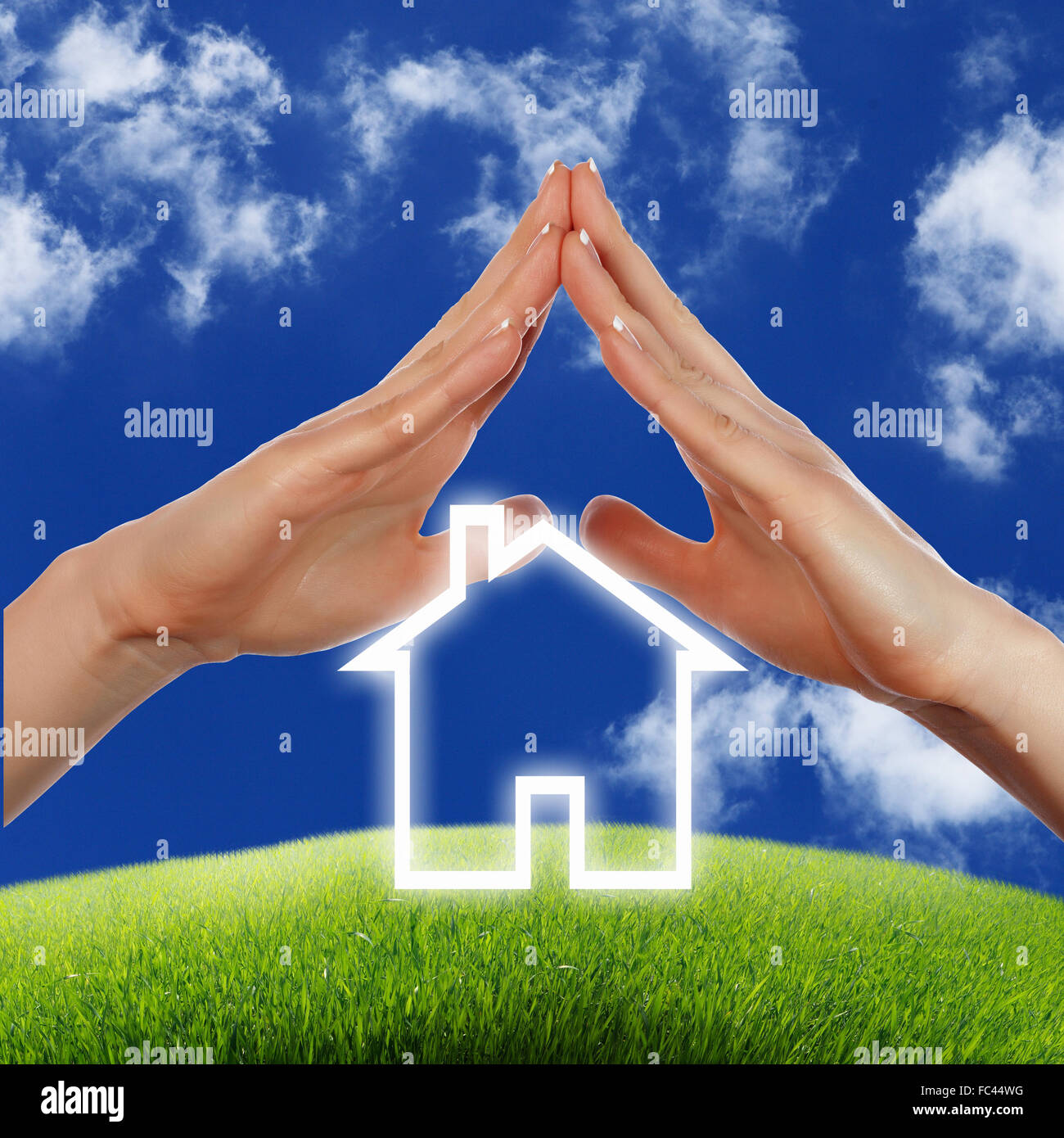 Human hand against blue sky background and house Stock Photo - Alamy