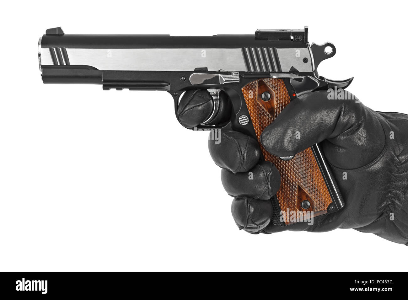 Hand with pistol Stock Photo - Alamy