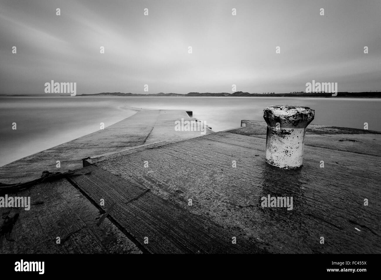 Monochrome long exposure capture of the quayside at Beadnell ...