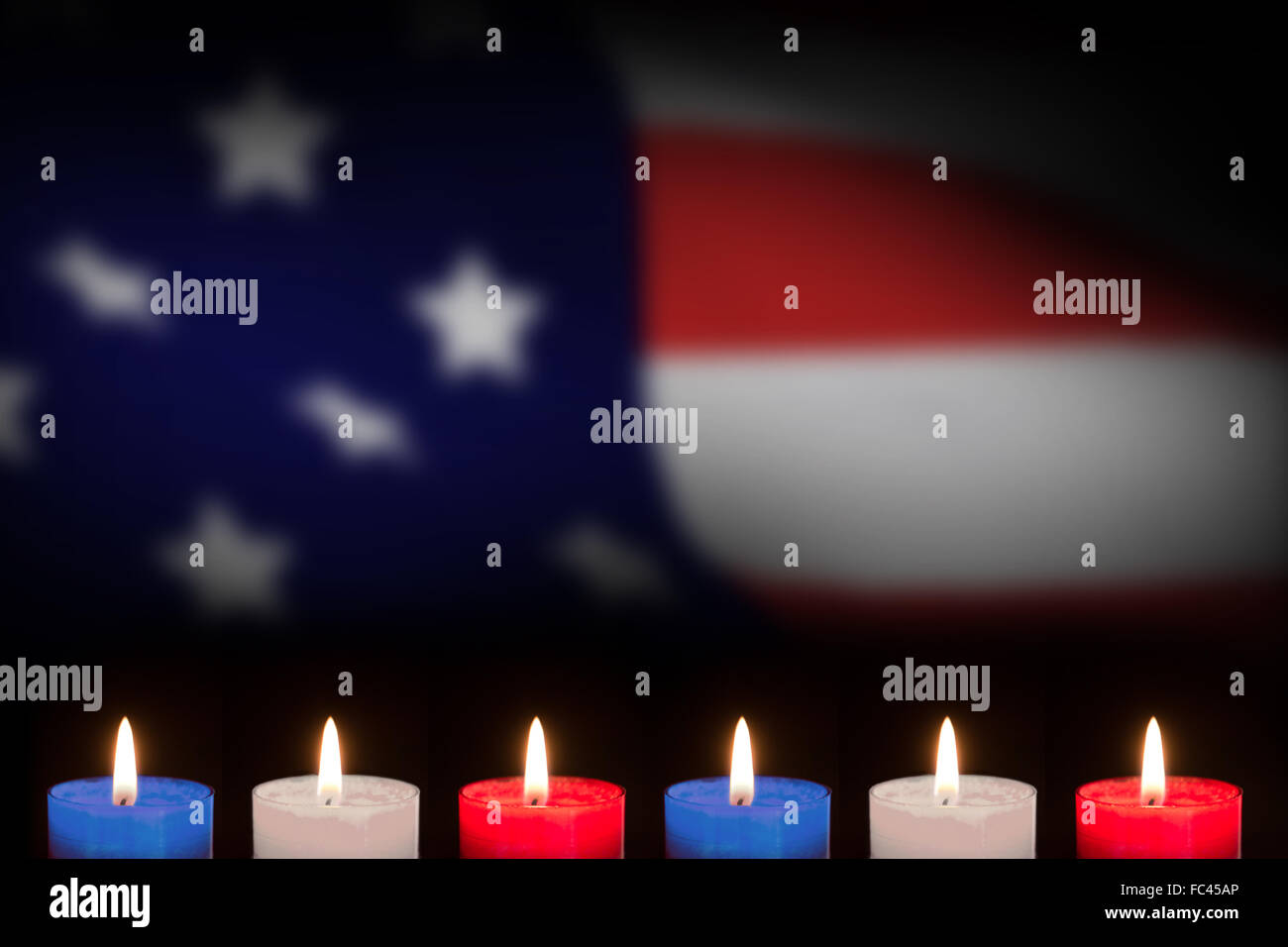 Composite image of candles on black background Stock Photo - Alamy
