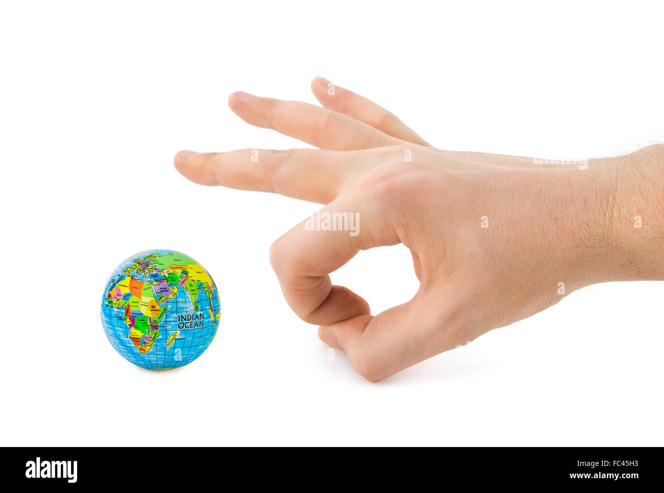 Hand and globe Stock Photo - Alamy