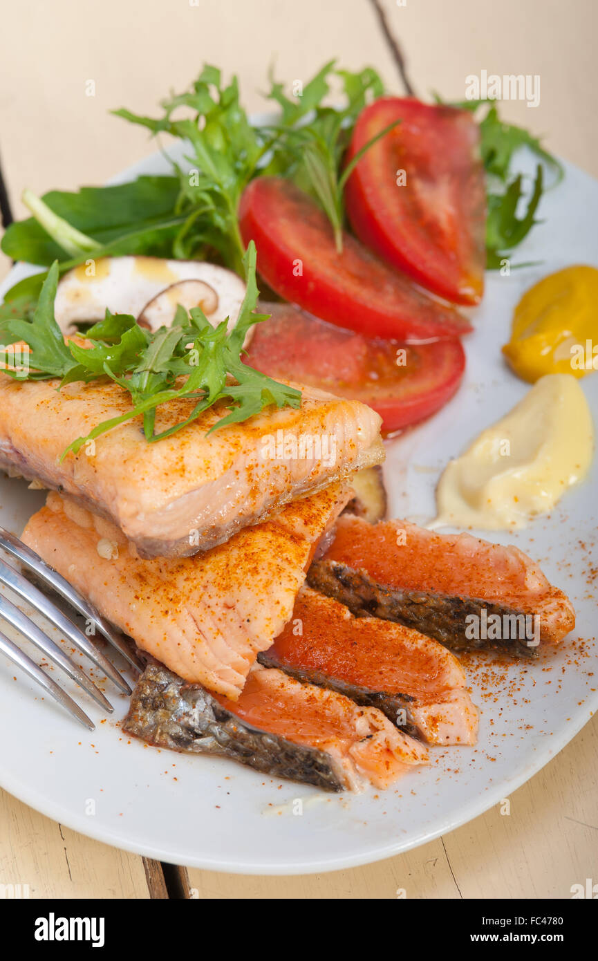 grilled samon filet with vegetables salad Stock Photo - Alamy