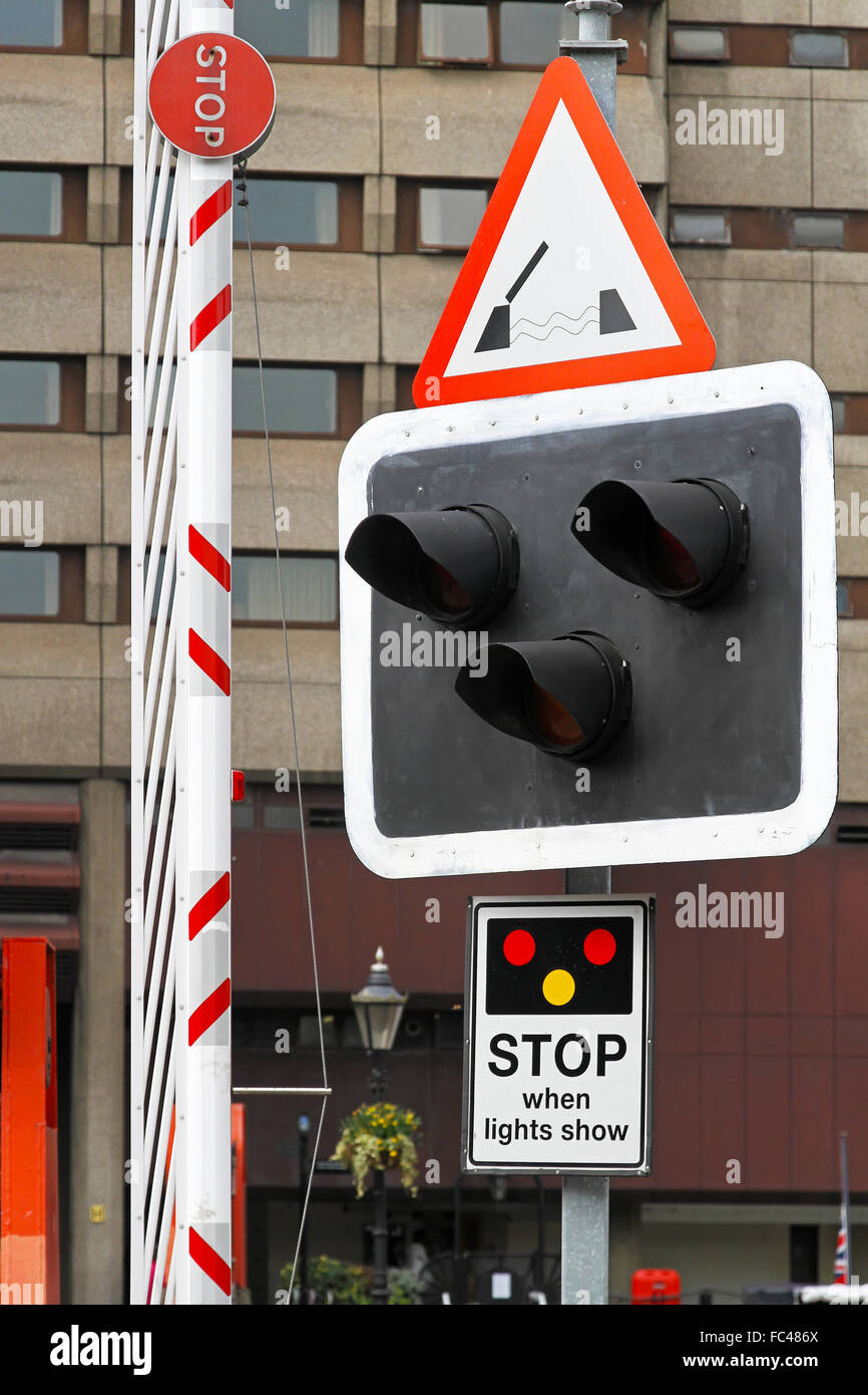 Moveable bridge sign lights and barrier ramp Stock Photo - Alamy