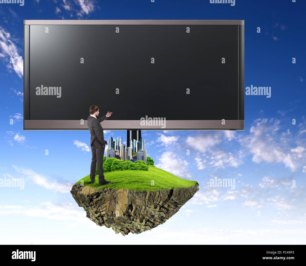 Business person standing near a blank billboard Stock Photo - Alamy