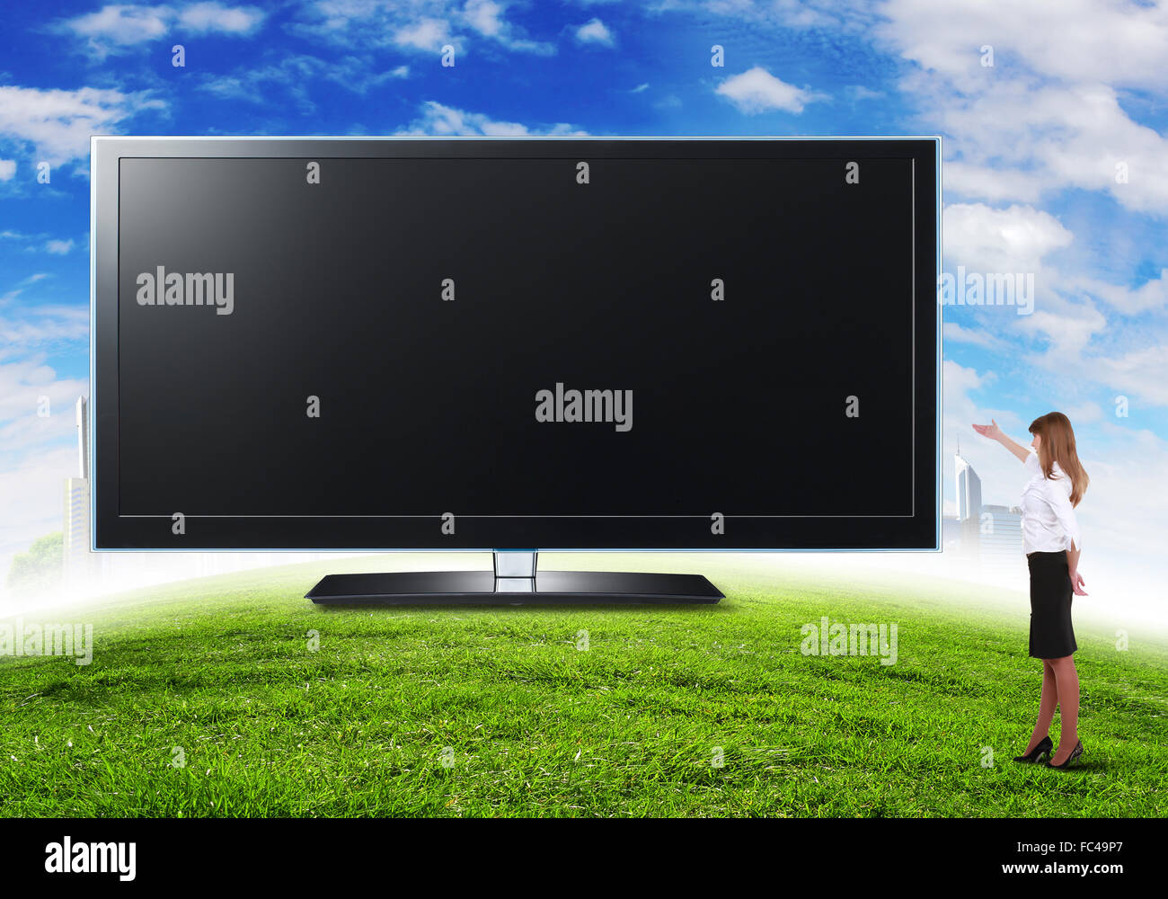 Business person standing near a blank billboard Stock Photo - Alamy
