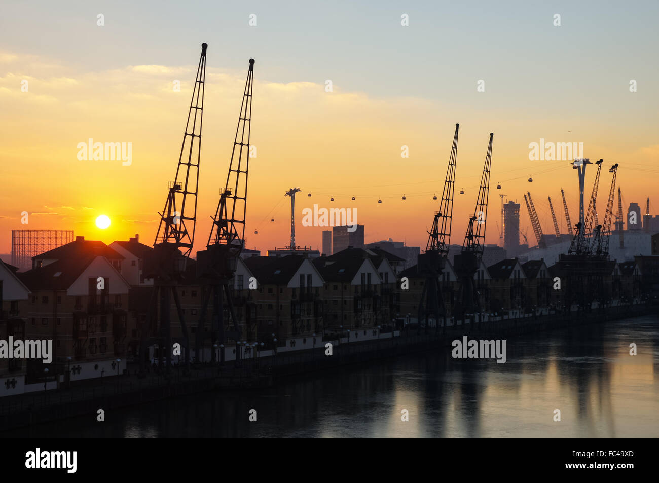 Sunset over London Docklands and Royal Victoria Dock, London England ...