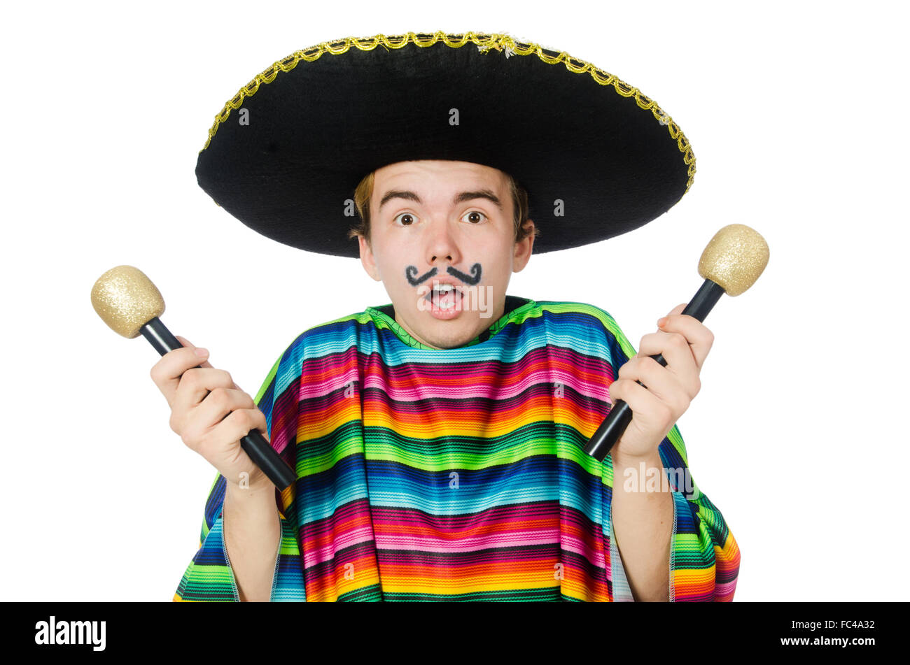 Funny young mexican shaking maracas isolated on white Stock Photo - Alamy