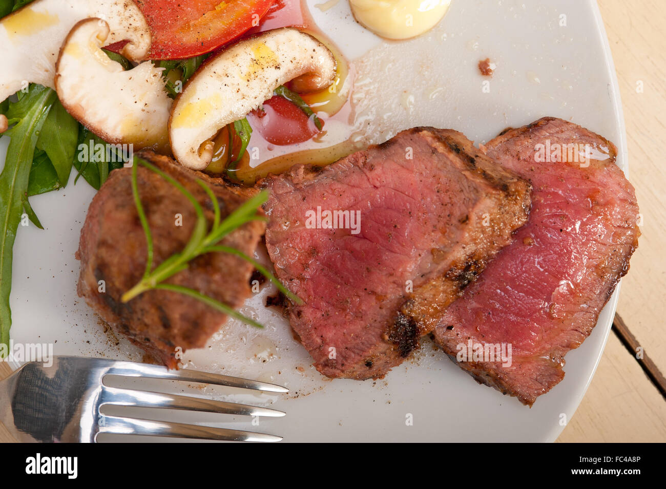 beef filet mignon grilled with vegetables Stock Photo - Alamy