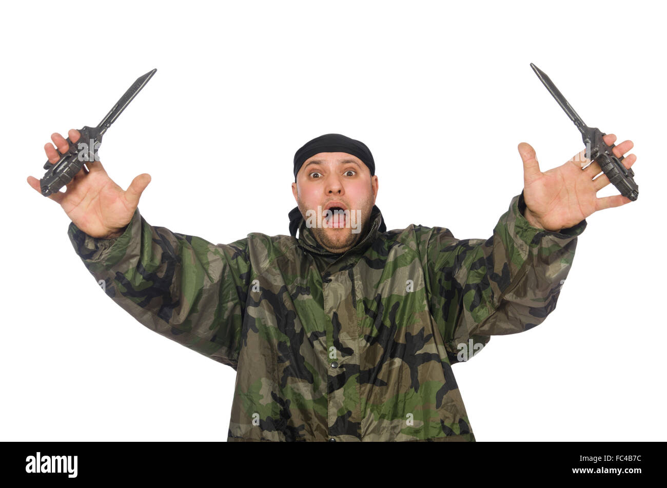 Young man in soldier uniform holding knife isolated on white Stock ...