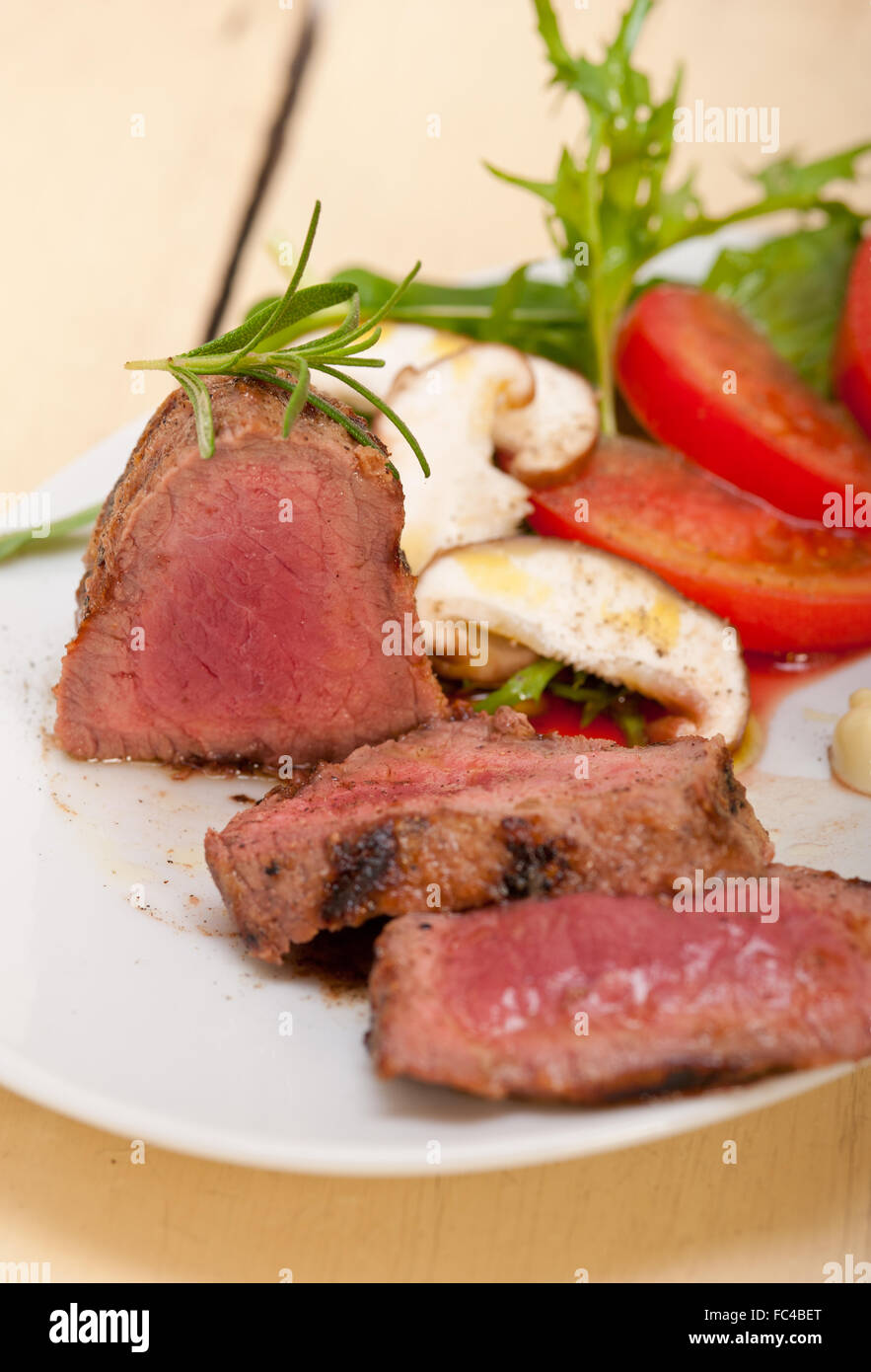 beef filet mignon grilled with vegetables Stock Photo - Alamy