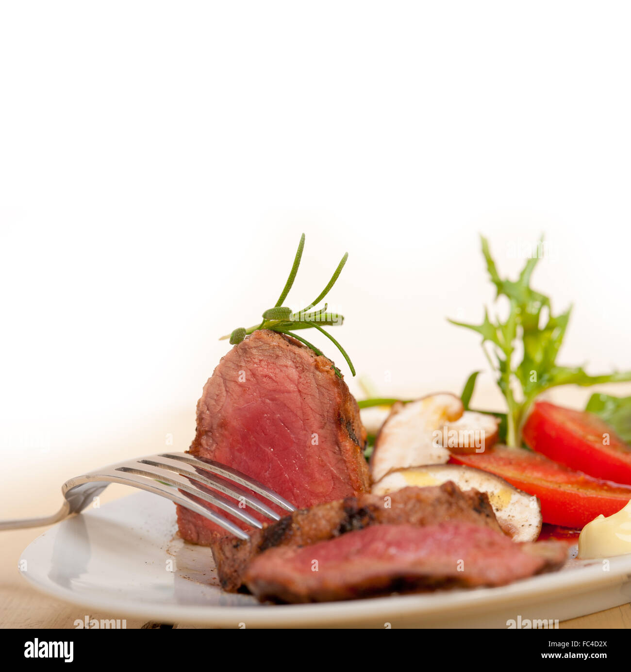 beef filet mignon grilled with vegetables Stock Photo - Alamy