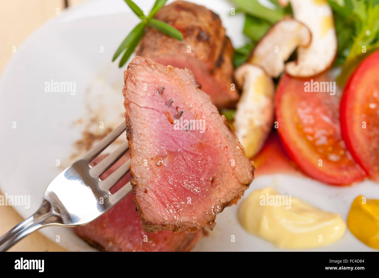 beef filet mignon grilled with vegetables Stock Photo - Alamy