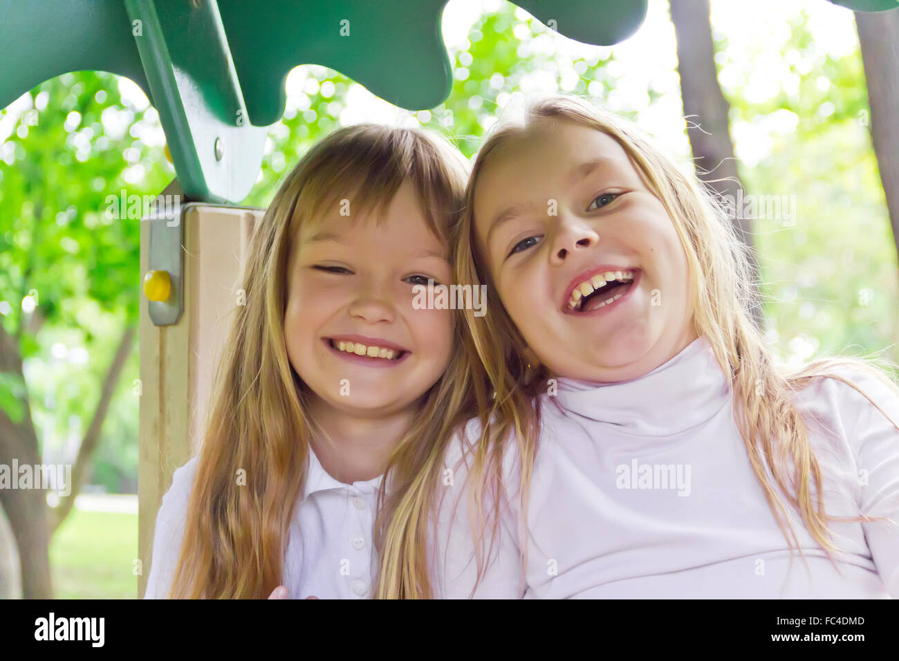 Cute two smiling girls Stock Photo - Alamy
